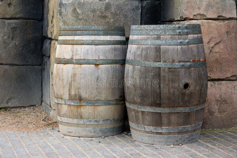 Barrels against a wall stock photo. Image of wine, wall - 23690584