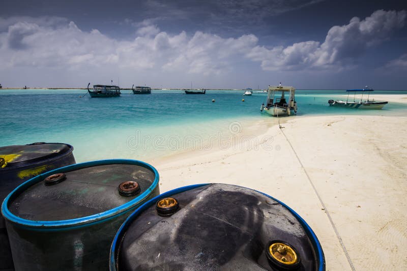 Blue barrels on the beach stock photo. Image of beach - 22299892