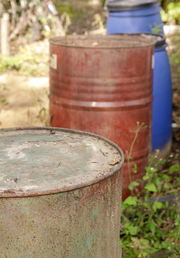 The Barrels Rusted Metal Plastic Stock Photo - Image of backyard ...