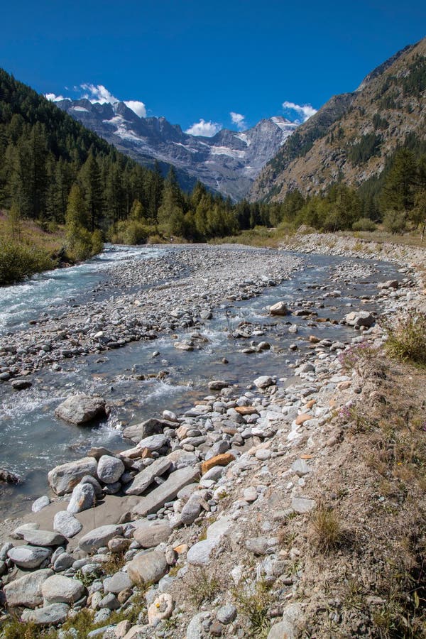 Barren Rocky Valley with a Dry Streambed in the Foreground and ...