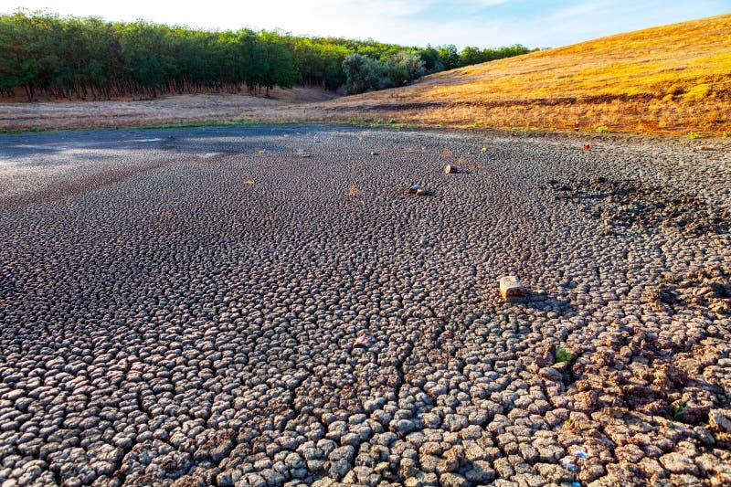 Barren Terrain with Cracks on Dry Land Stock Photo - Image of fissures ...