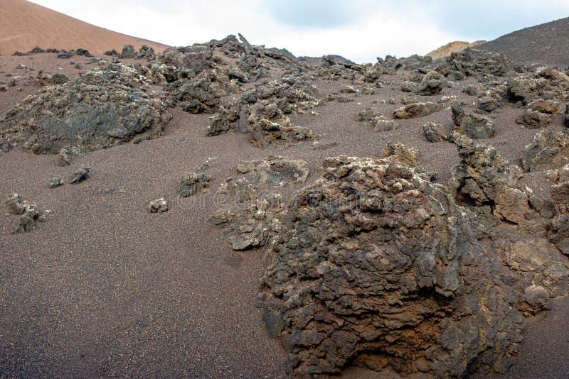 Volcanic Landscape with Dark Sand and Rocks Stock Photo - Image of ...