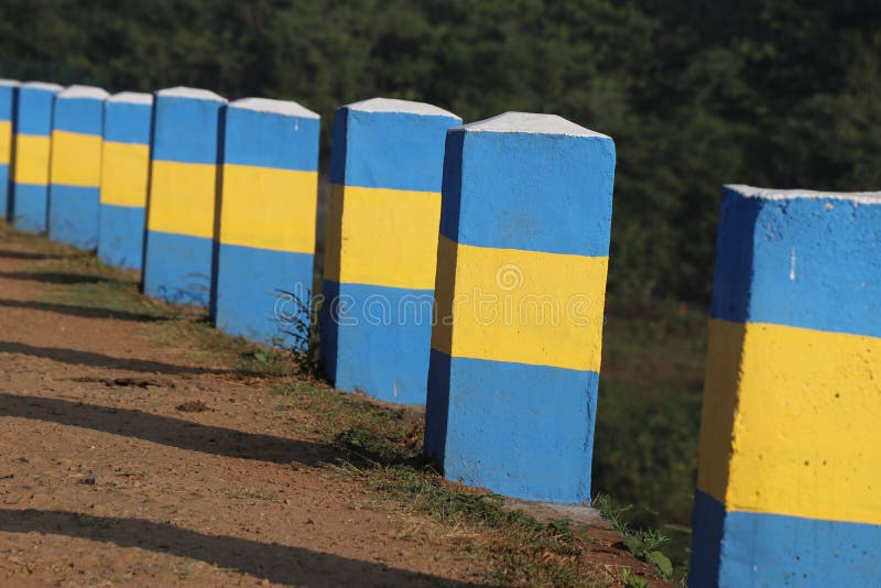 Barrier Blocks of Concrete by the Side of the Road Shining in the ...