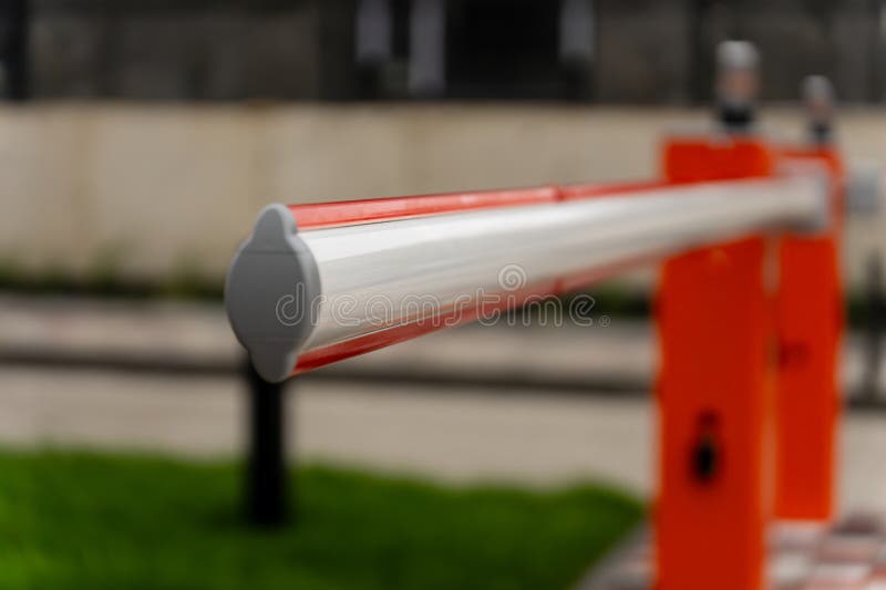 A Barrier Gate Stands Closed, Regulating Access To a Controlled Area in ... A Barrier Gate Stands Closed, Regulating Access To a Controlled Area in ...