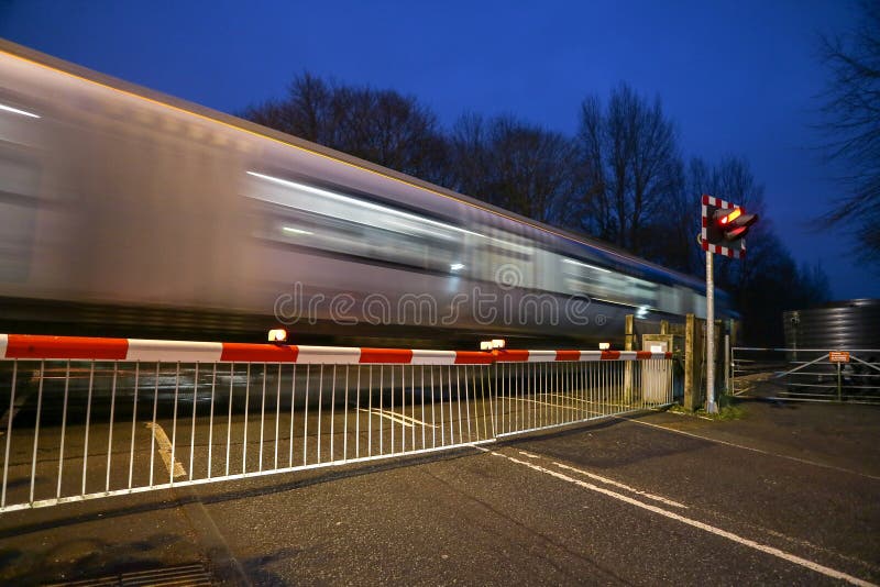 Barriers Down at the Level Crossing Stock Image - Image of movement ...