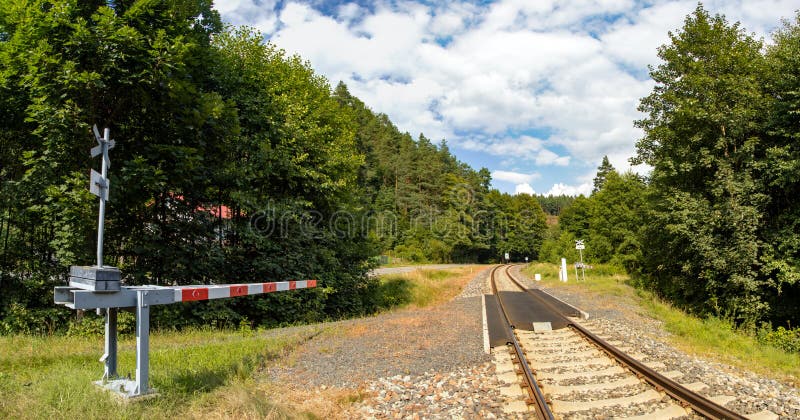 Barriers on a Path that Crosses the Track Stock Photo - Image of path ...