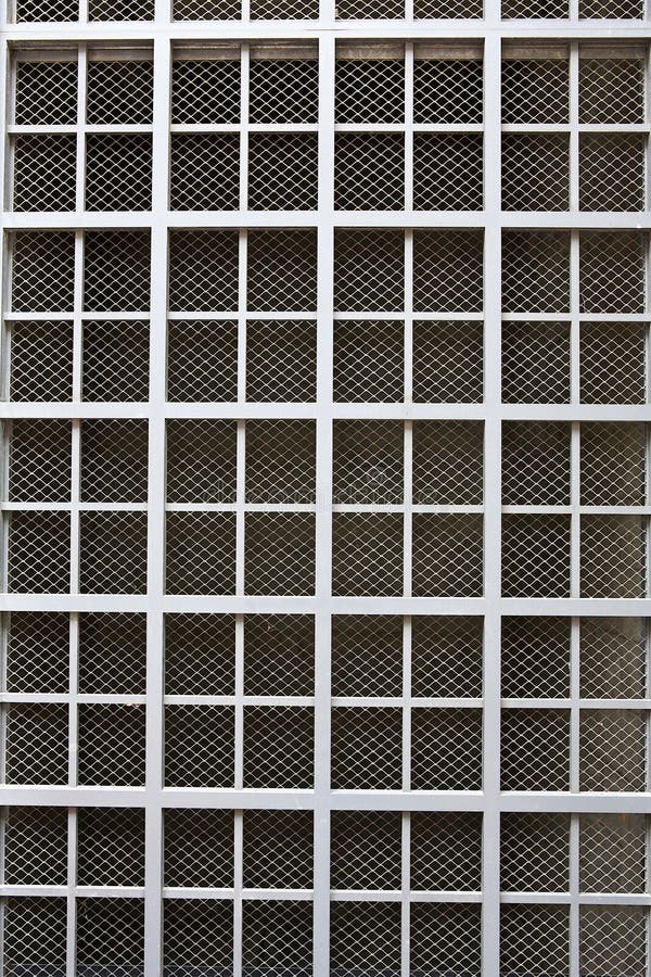 Window With Bars And Mesh Screen On Metal Building Stock Photo - Image ...