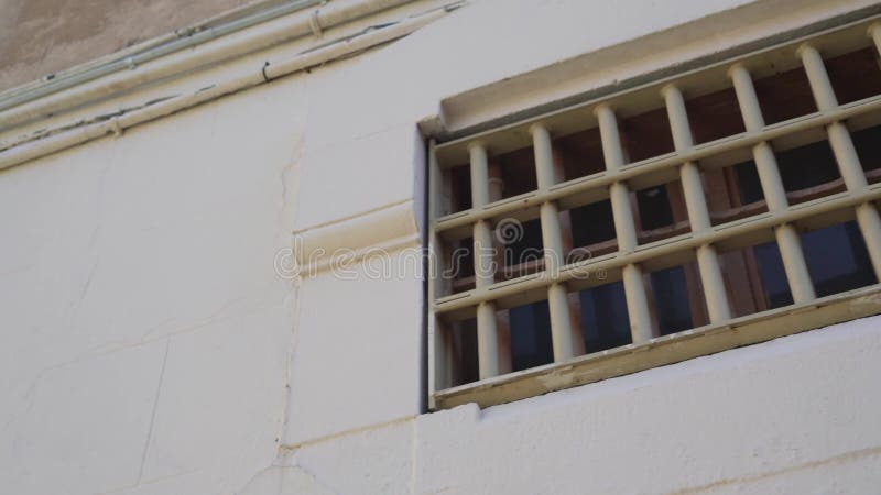 Bars on the Window of the Prison Cell, Outside View Stock Footage ...
