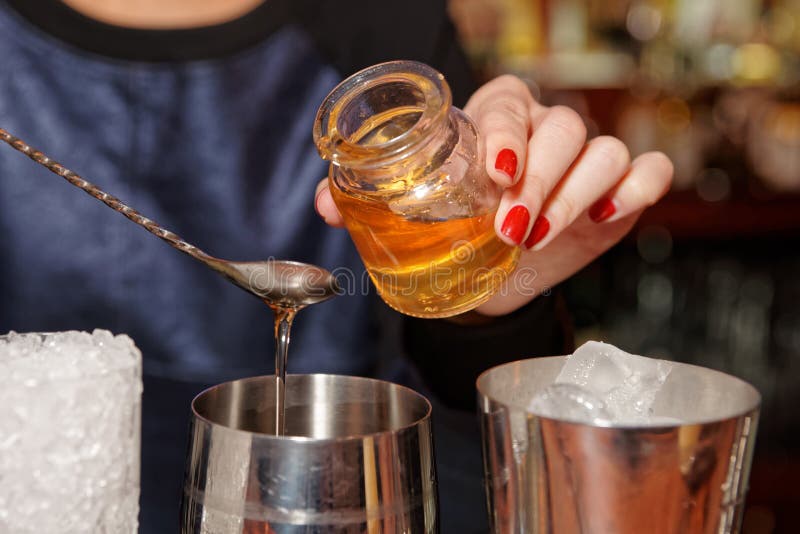 Bartender is Adding Honey To the Glass Stock Image - Image of ...