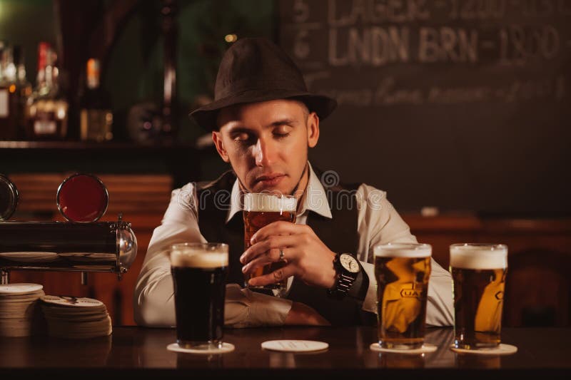 Bartender at Bar Counter Tasting Various Varieties of Craft Beer Stock ...