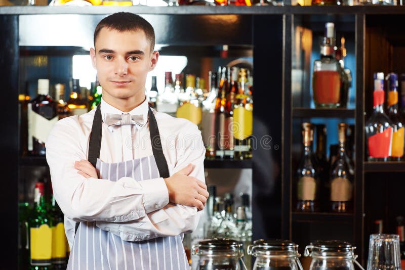 Bartender at bar stock photo. Image of drink, liquor - 61009364