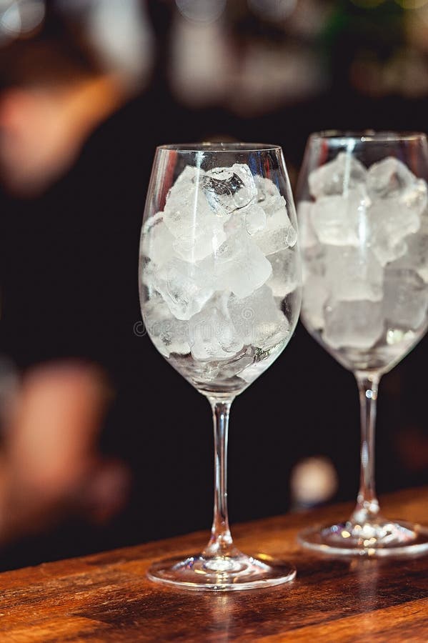 Bartender Cooling Out Cocktail Glass with Ice Stock Image - Image of ...