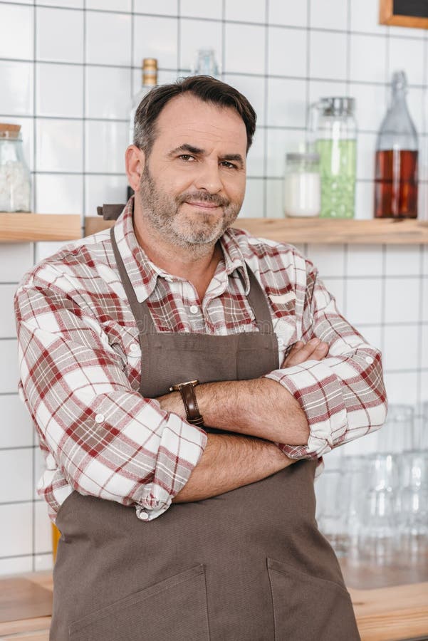 Bartender with Crossed Arms Leaning Back Stock Image - Image of ...