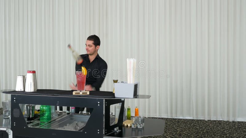 Bartender Juggling Bottles and Shaking Cocktail at Mobile Bar Stock ...