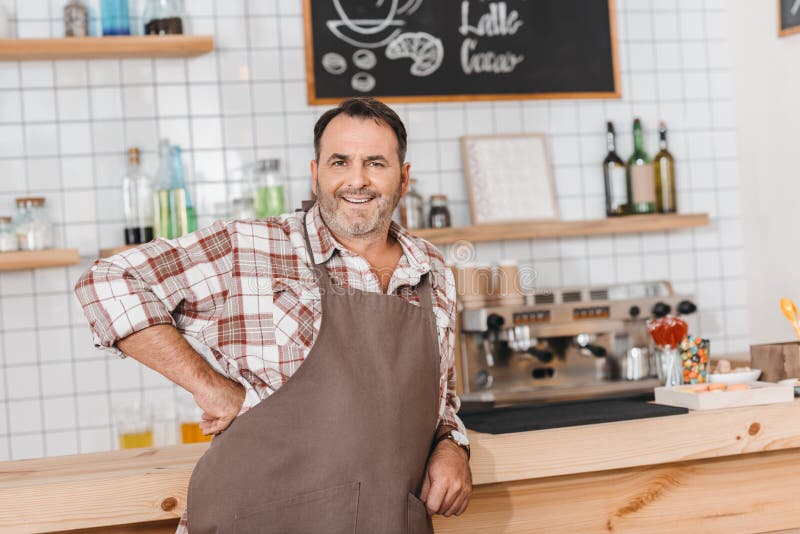 Bartender Leaning on Bar Counter Stock Photo - Image of occupation ...