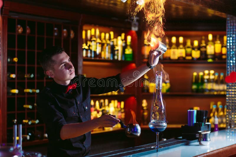 Bartender Makes Hot Cocktail in a Restaurant in the Bar Stock Photo ...