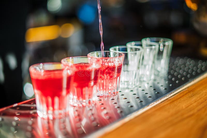 Red Shots on the Bar Counter. Stock Image - Image of alcohol, close ...