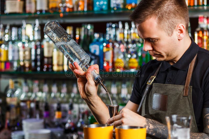 The Bartender Making Cocktail Stock Image - Image of handsome, glass ...