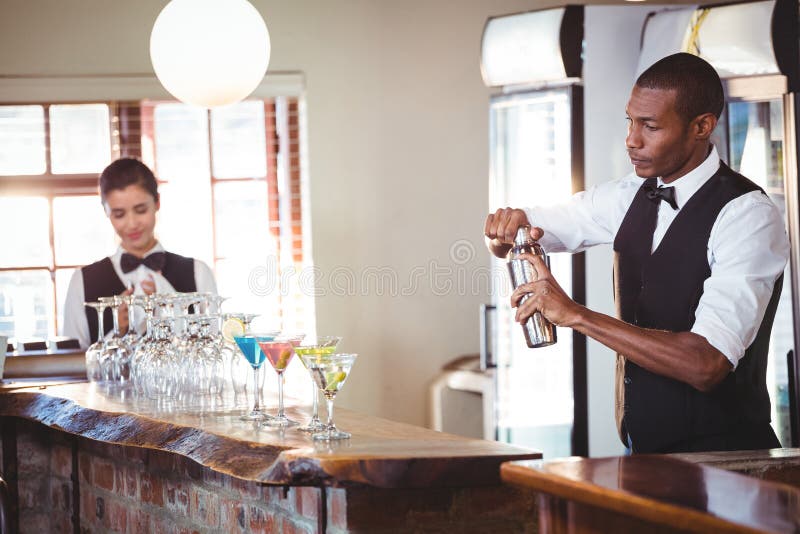 Bartender Mixing a Cocktail Drink in Cocktail Shaker Stock Image ...