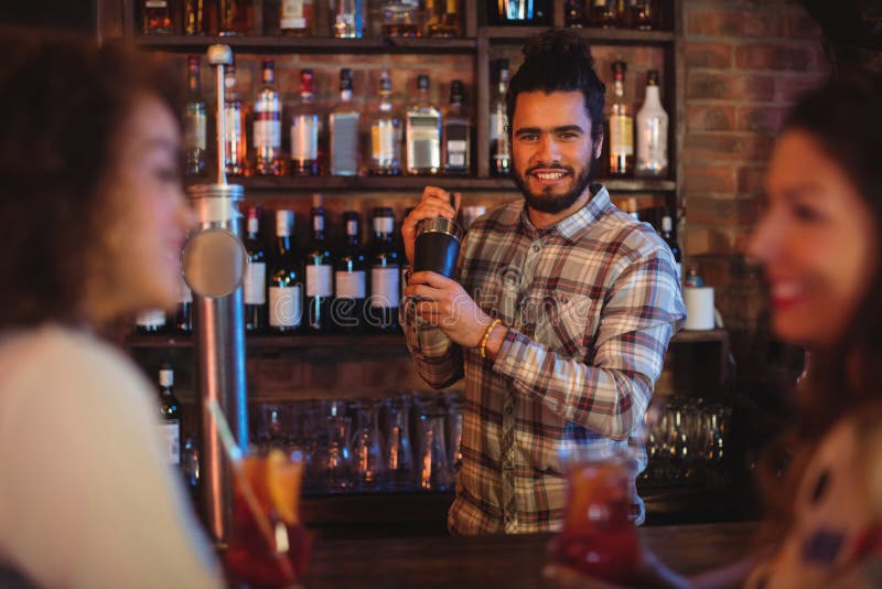 Bartender Mixing a Cocktail Drink in Cocktail Shaker Stock Image ...