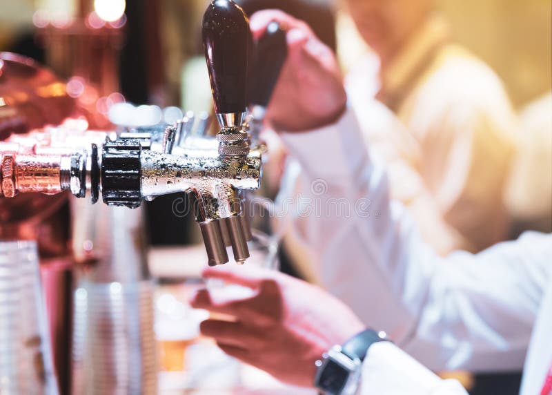 Bartender Pouring Draft Beer in the Bar, Barman Hand at Beer Tap ...