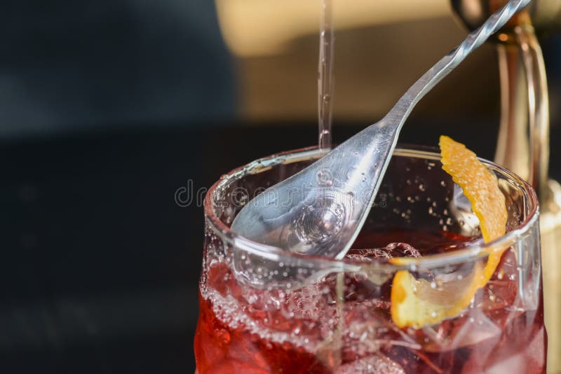 Bartender Pouring Liquid in a Cocktail Drink. Summer Alcohol Drink in a ...
