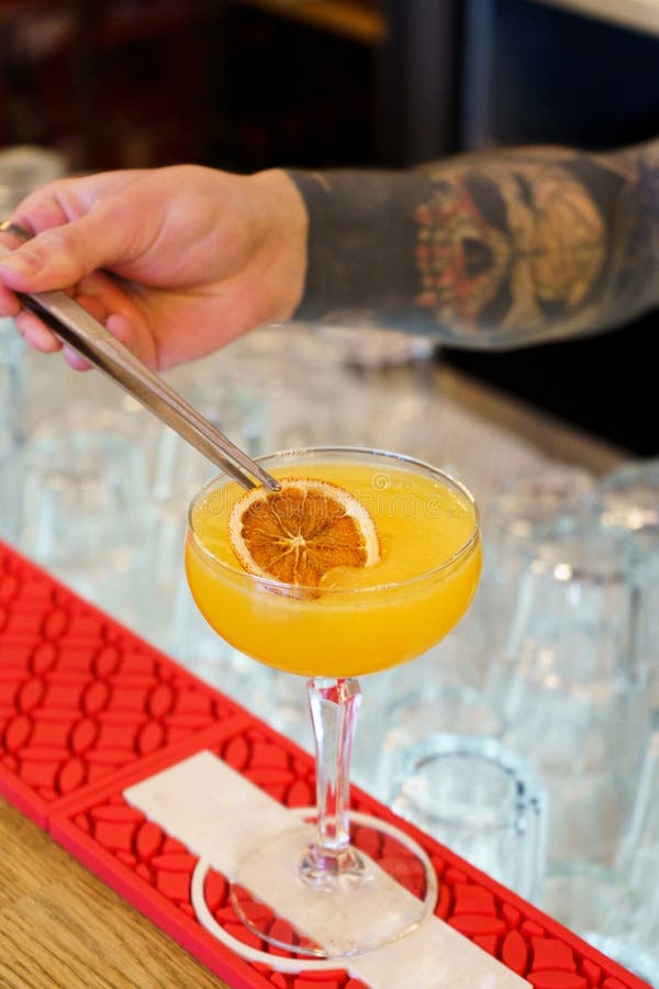 Bartender Preparing an Alcoholic Cocktail on the Bar Counter Stock ...