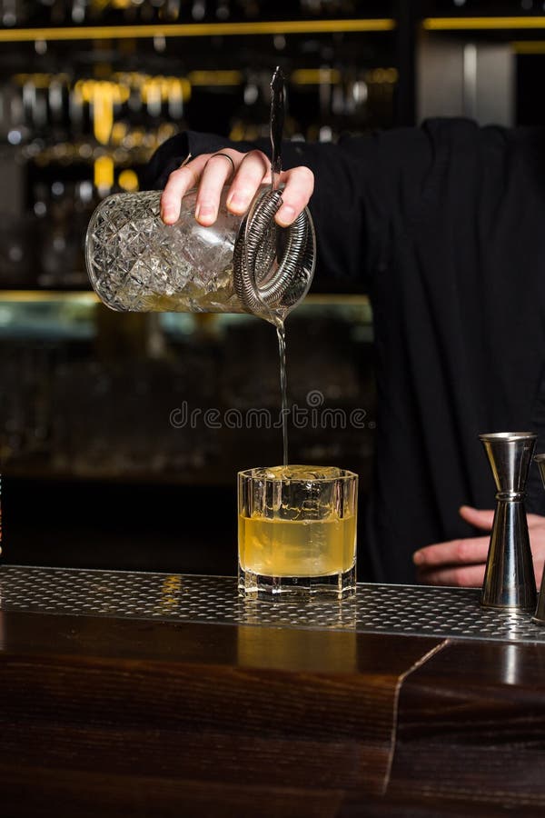 Bartender Preparing Alcoholic Cocktail Stock Photo - Image of beverage ...
