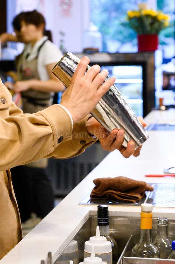 Bartender Shaking Cocktail Shaker in Modern Bar Stock Image - Image of ...