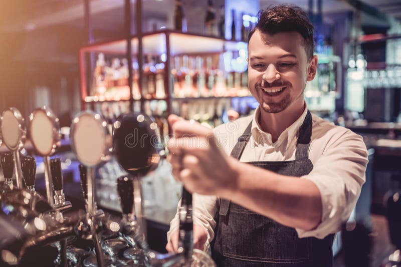 Bartender in pub stock photo. Image of hand, occupation - 94551372