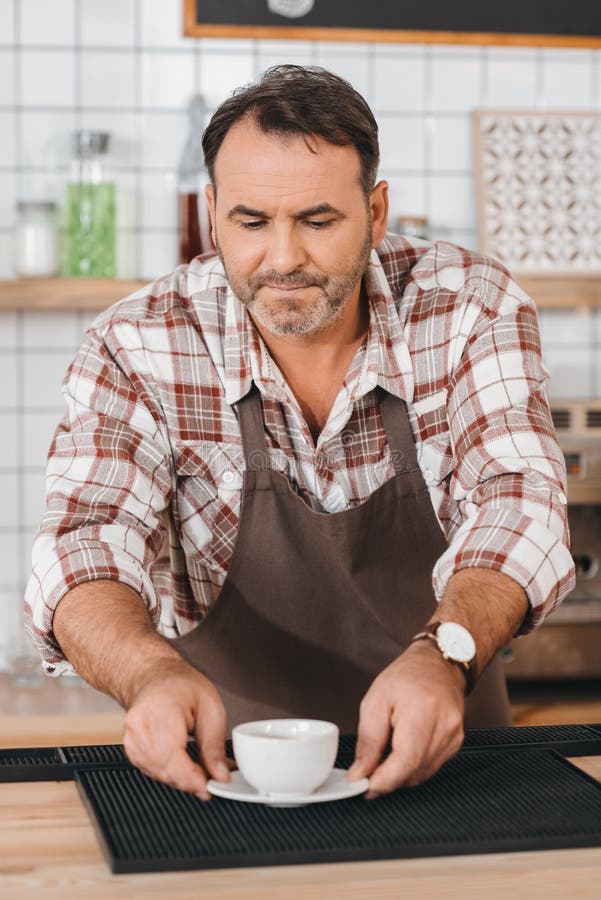 Bartender Putting Coffee on Bar Counter Stock Image - Image of handsome ...