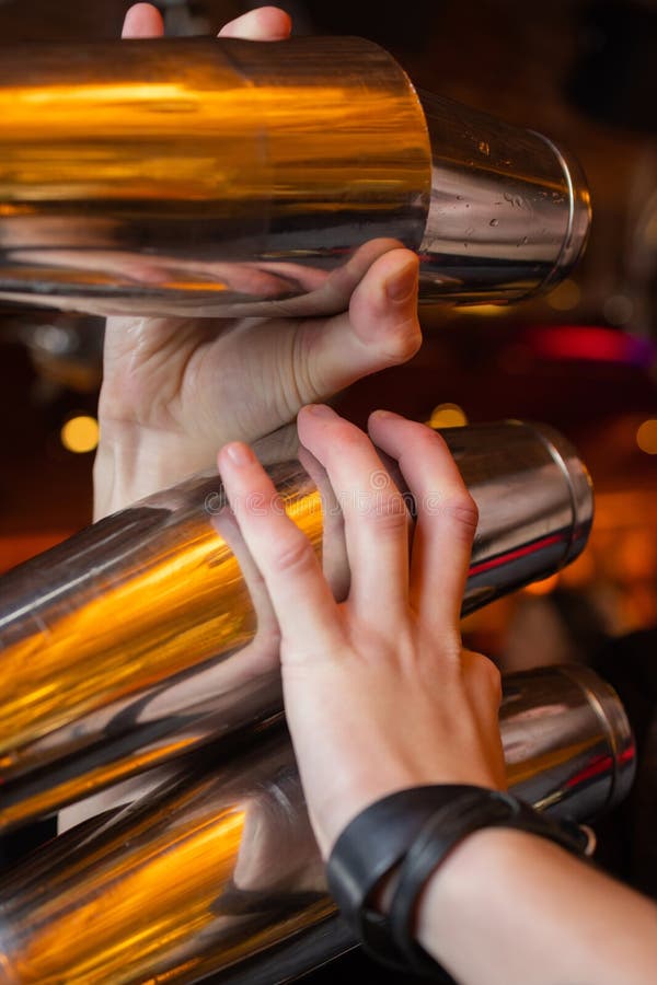 Bartender S Hands Holding a Professional Shaker Against of the Bar ...