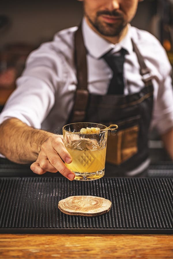 Bartender Serving a Ginger Cocktail Stock Image - Image of glass ...