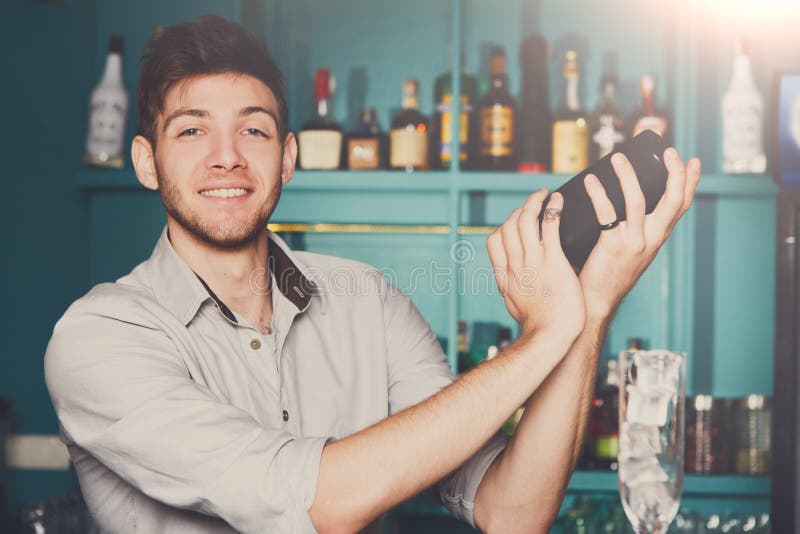 Bartender Shaking and Mixing Alcohol Cocktail Stock Photo - Image of ...