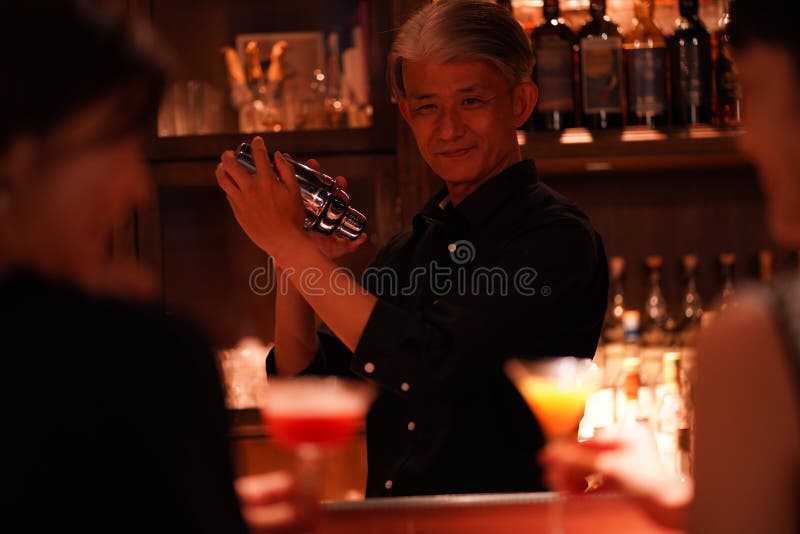 Bartender shaking a shaker stock photo. Image of eating - 243964406