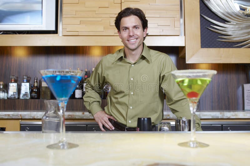 Bartender Standing Behind Bar Counter Stock Photo - Image of people ...