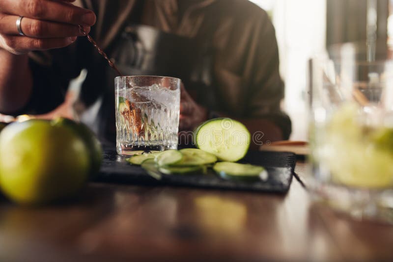 Bartender Stirring a Cocktail Stock Image - Image of people ...