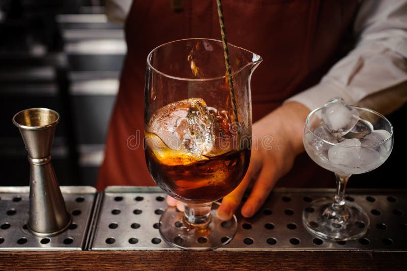Bartender is Stirring Cocktails on the Bar Counter Stock Photo - Image ...
