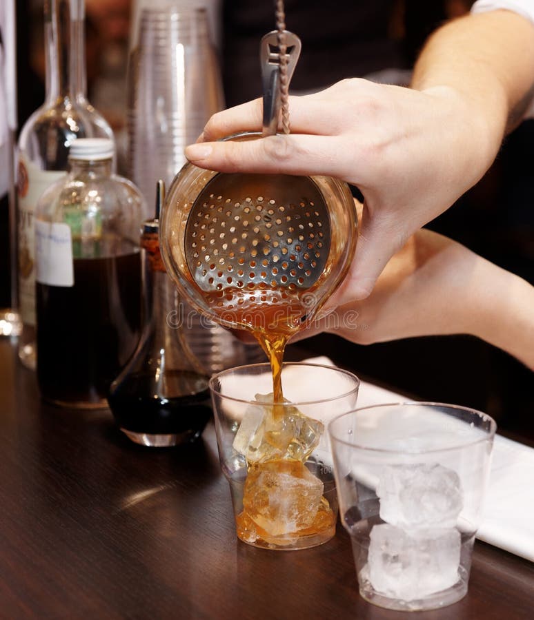Bartender is Straining Cocktail into Glass Stock Image - Image of ...