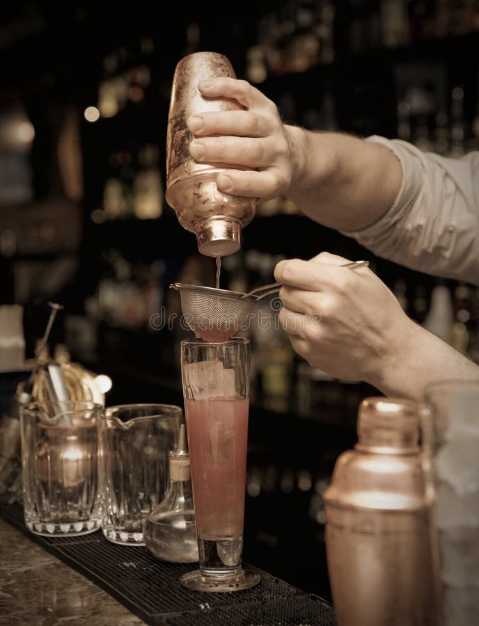 Bartender is Straining Cocktail Stock Image - Image of barman ...