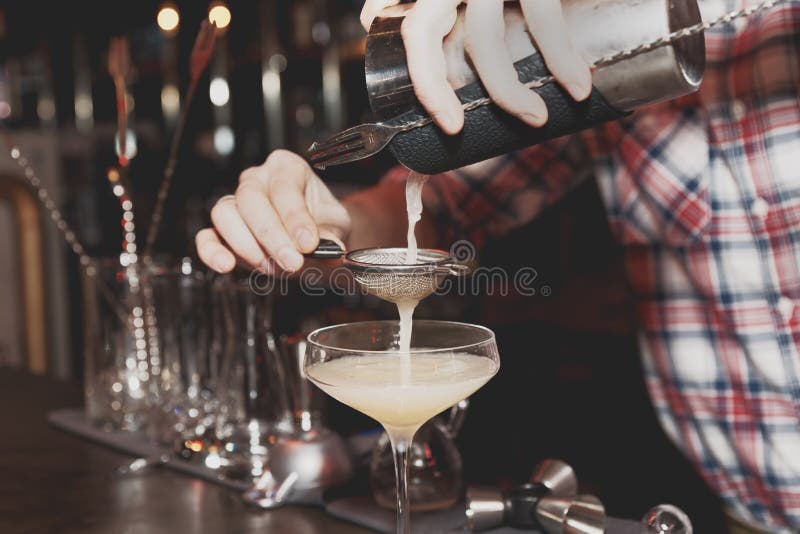 Bartender is Straining Drink in a Glass Stock Photo - Image of labor ...