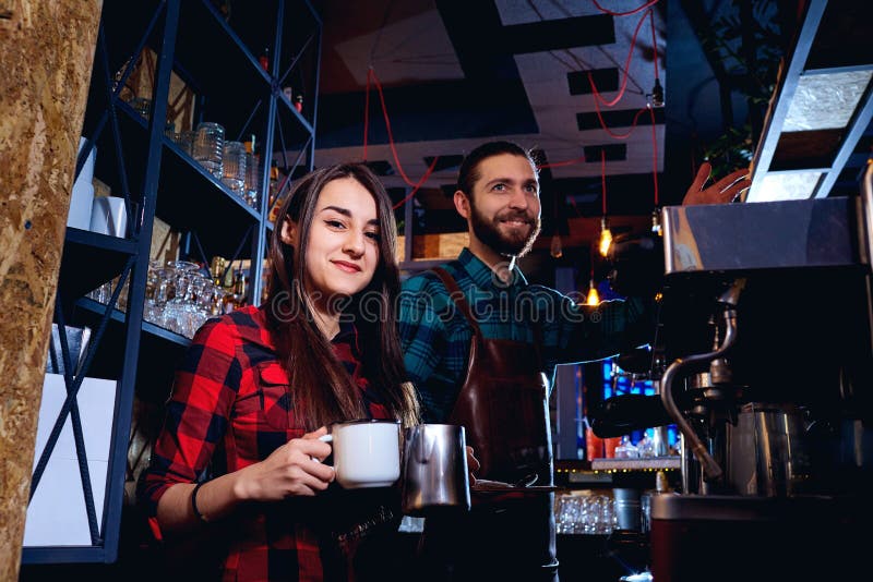 Bartender and Waiter are Working Behind Counter in the Bar Stock Image ...