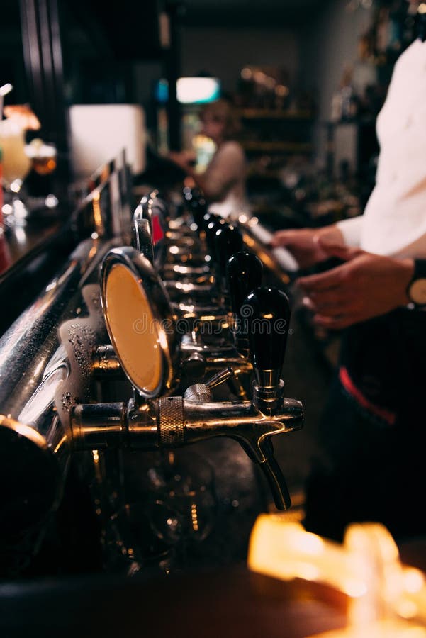 The Bartender Works at the Bar. the Working Process Stock Image - Image ...