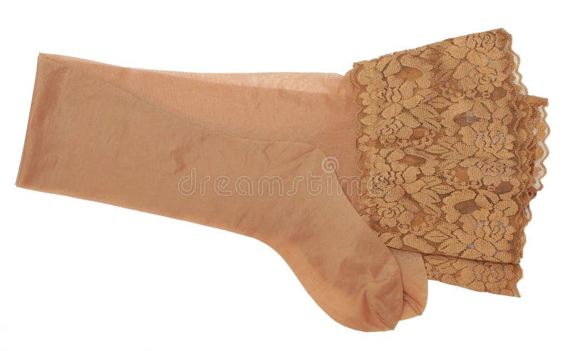 Bas beiges image stock. Image du vêtement, mensonge, pied - 12607743