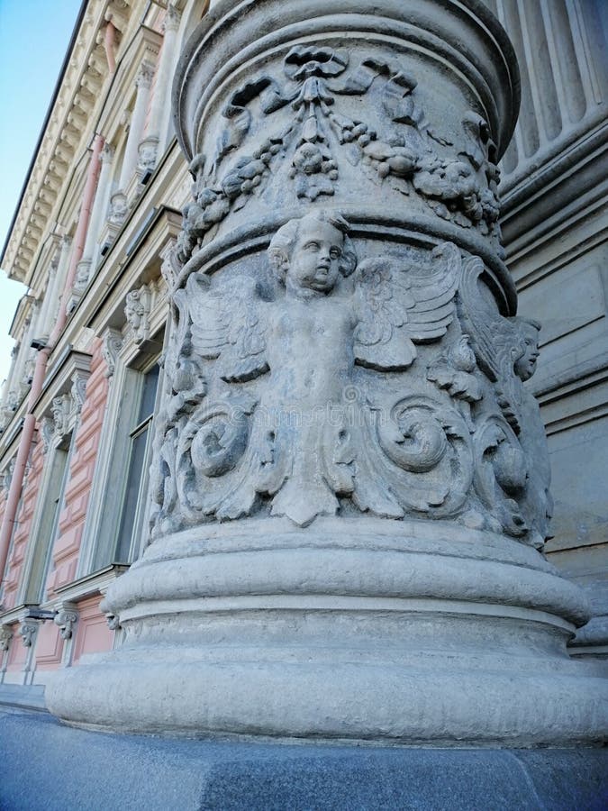 Bas-relief with Angels on the Columns of the Building Stock Image ...