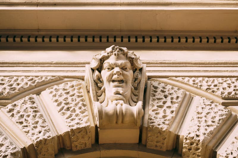 A Bas-relief on the Facade in the Form of a Human Face. Stock Image ...