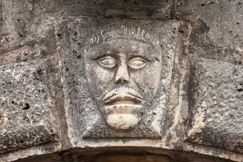 Bas-relief with Face on Ancient House Facade Stock Photo - Image of ...