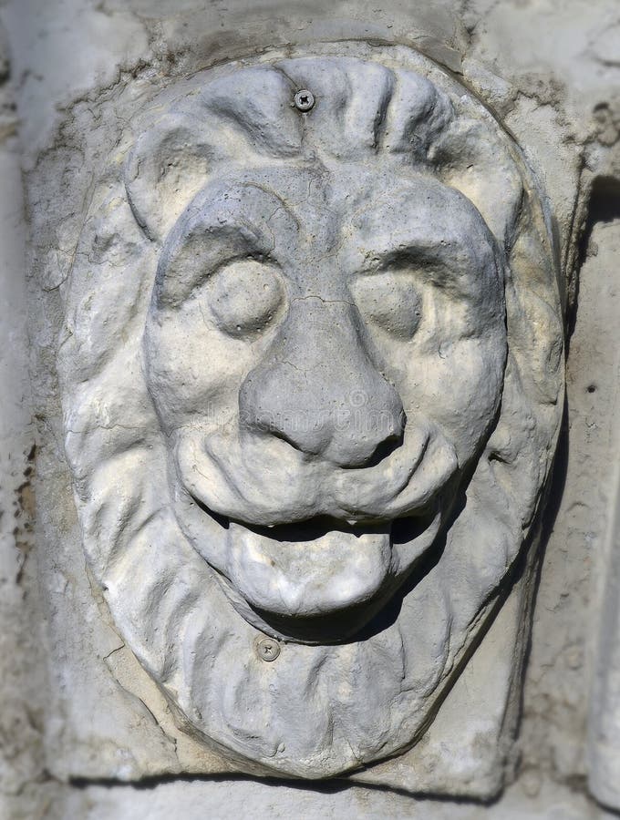 Bas-relief head of a lion stock image. Image of architecture - 43685017