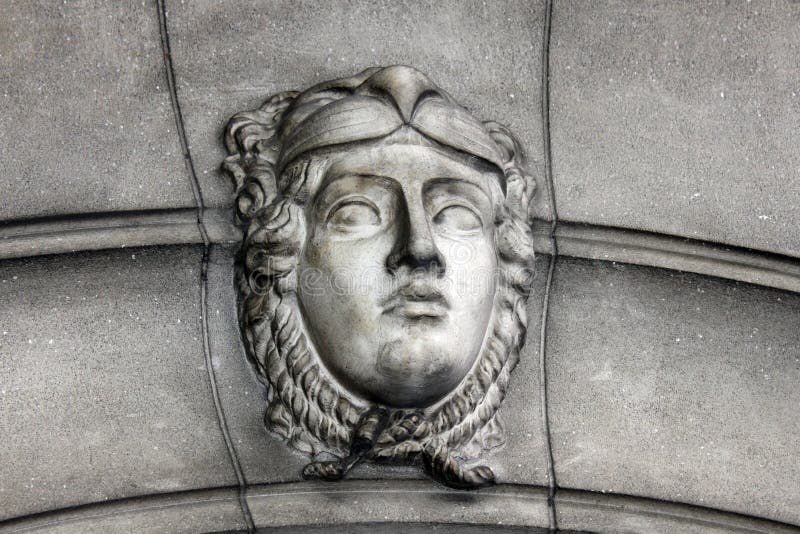 Bas relief: women face stock photo. Image of montevideo - 78829402