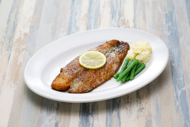 Basa fish fillet meunière stock photo. Image of spice - 369856000